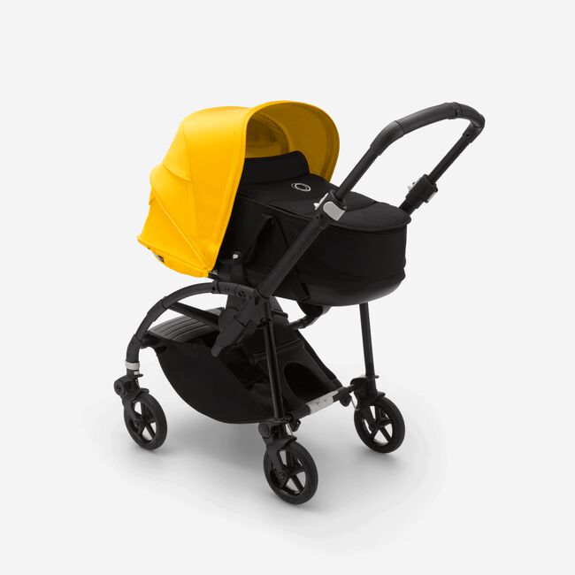 Carrito Bugaboo Bee 6 con capazo y silla Capota amarillo limón, fundas negras, chasis negro ...